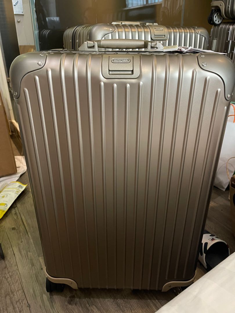 Rimowa titanium 63L etag, Hobbies & Toys, Travel, Luggage on Carousell