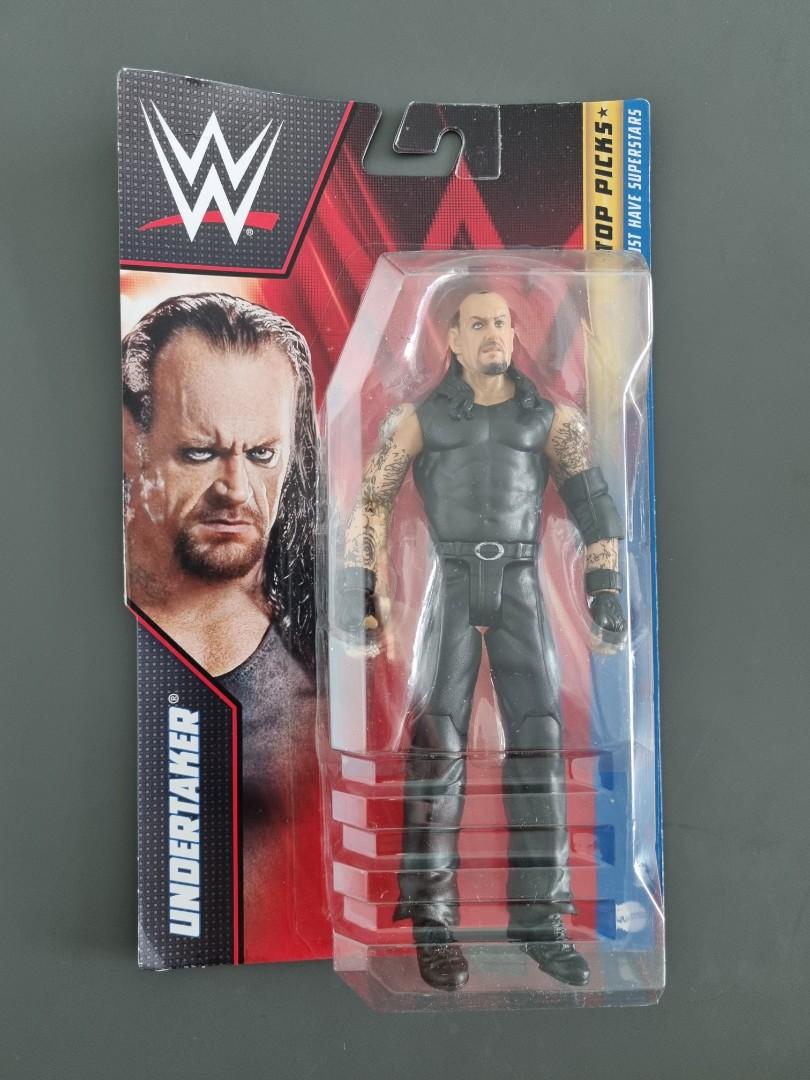 WWE Top Picks Elite Basic Roman Reigns Seth Rollins Braun Strowman ...