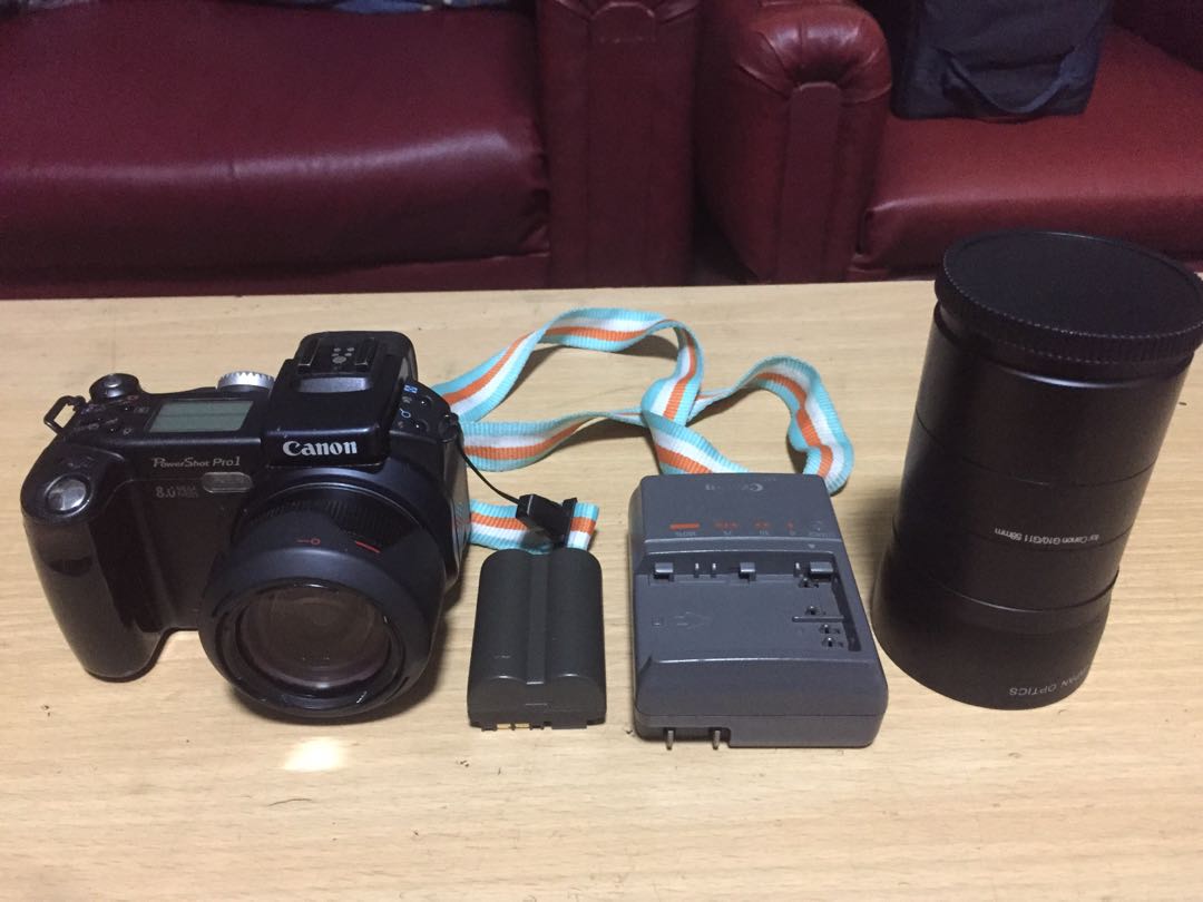 Defective Canon PowerShot Pro 1, Photography, Cameras on Carousell