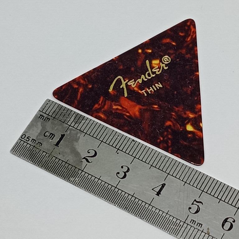 Authentic Fender Triangle Pick, Hobbies & Toys, Music & Media, Music ...