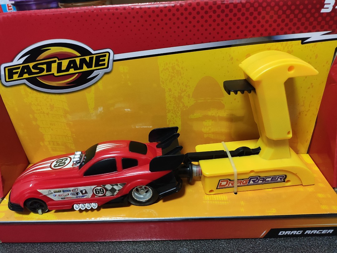 Toy trigger launched racing car, Hobbies & Toys, Toys & Games on Carousell