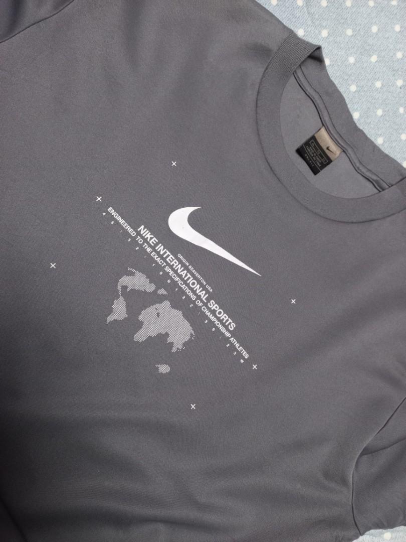 VTG Nike earth map centre swoosh, Men's Fashion, Tops & Sets, Tshirts ...