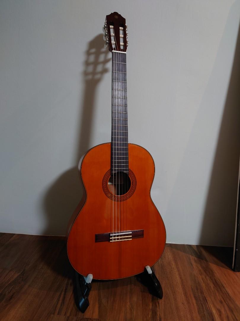 Yamaha Solid Top Classical Guitar with case and stand, Hobbies & Toys ...