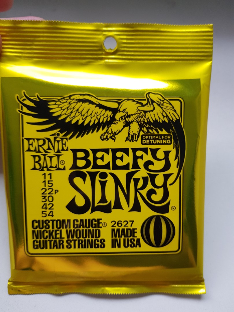 Ernie Ball Beefy Slinky guitar strings, Hobbies & Toys, Music & Media ...
