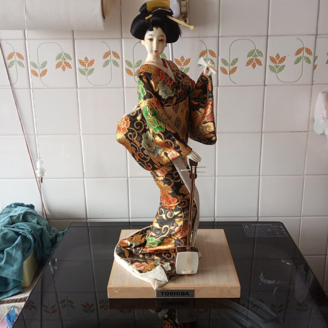 1985 Japanese geisha in kimono holding shamisen stringed instrument ...