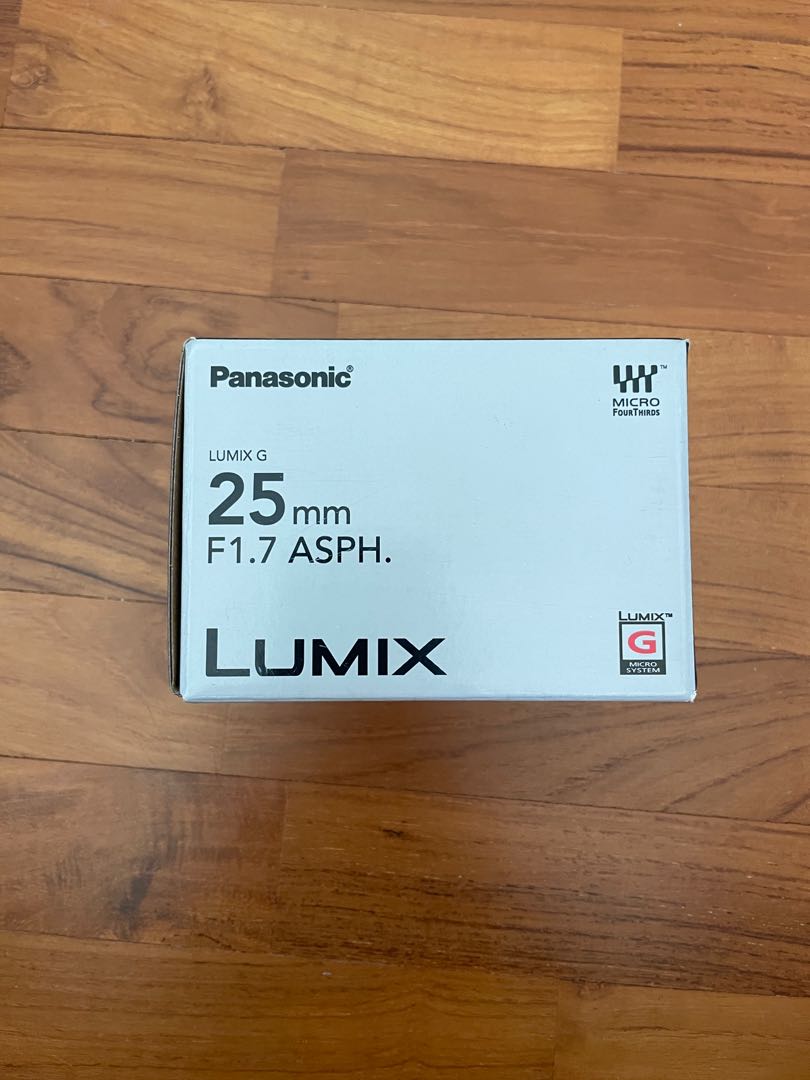 Panasonic 25mm 1.7 (Brand New) black, Photography, Lens & Kits on Carousell