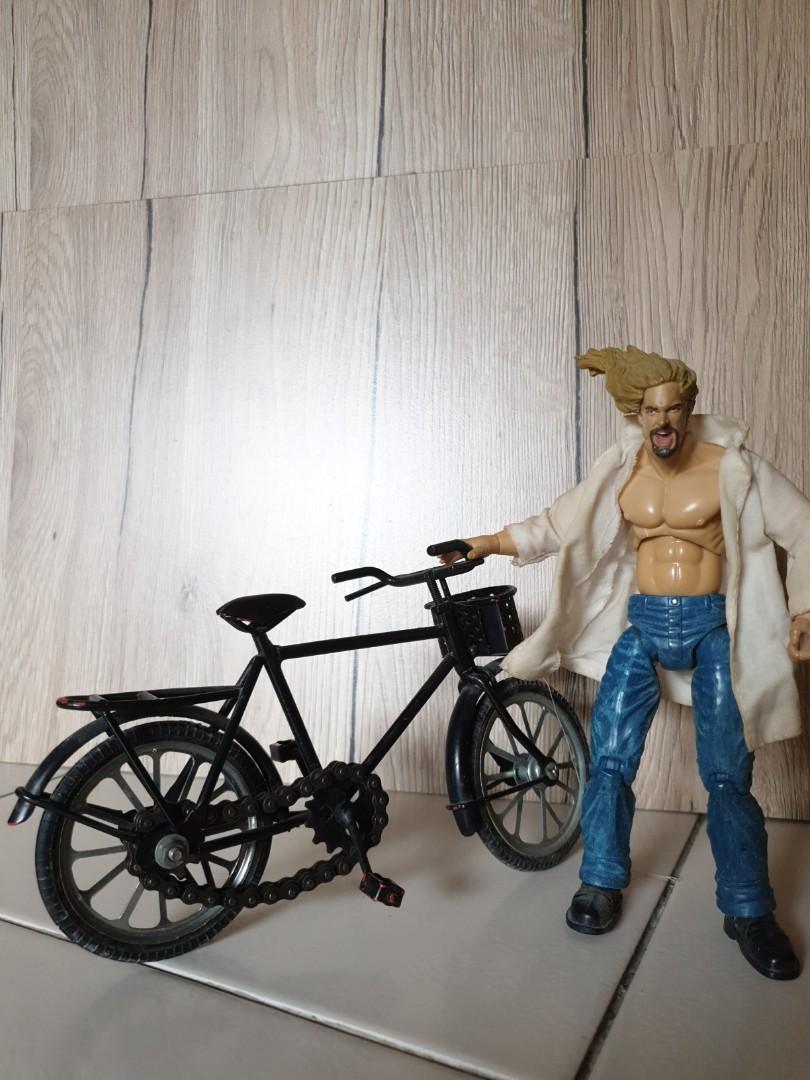 Man with bike figure collectable, Hobbies & Toys, Collectibles ...