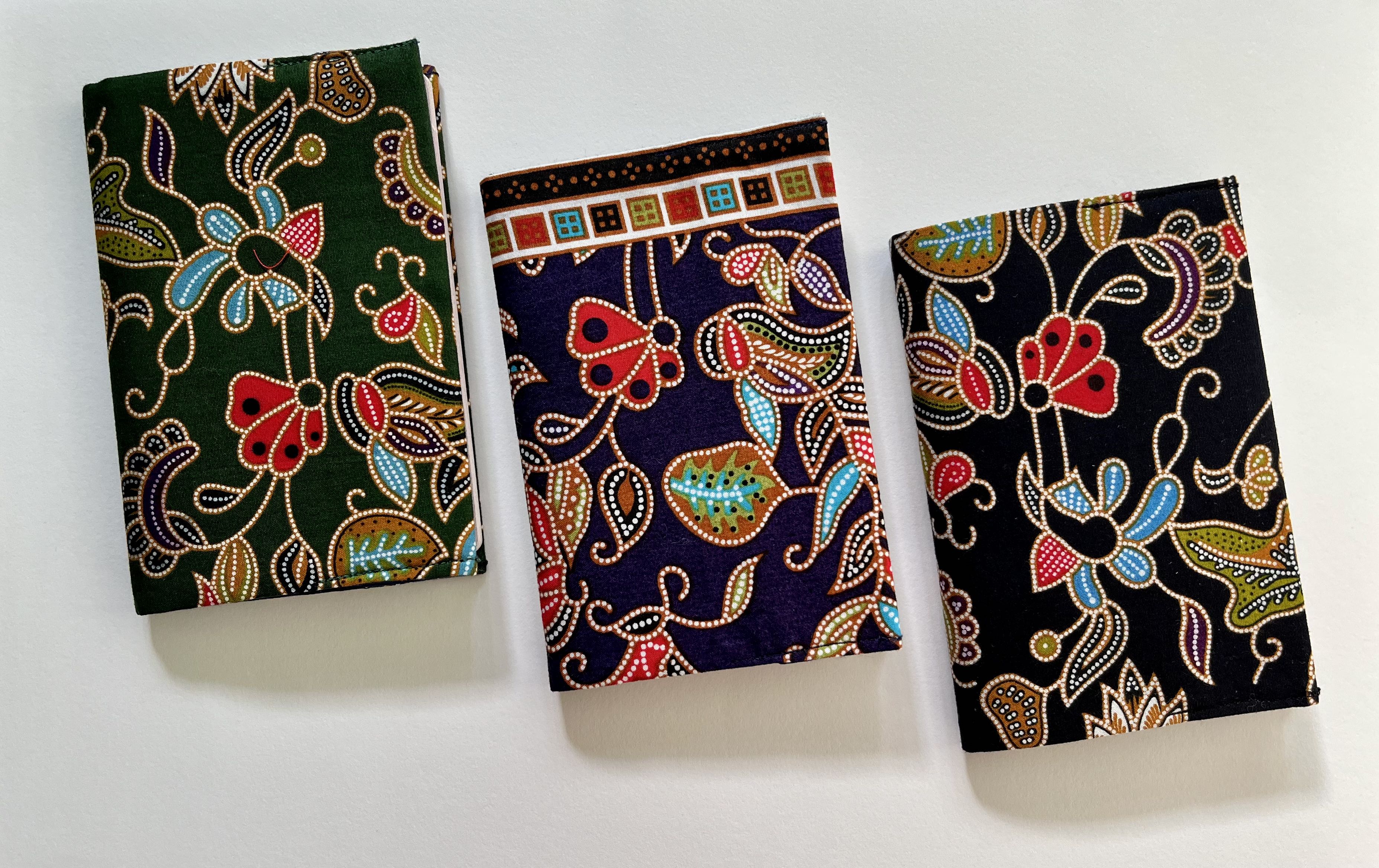 SQ inspired Batik passport holder. Standard size. Comes with ...