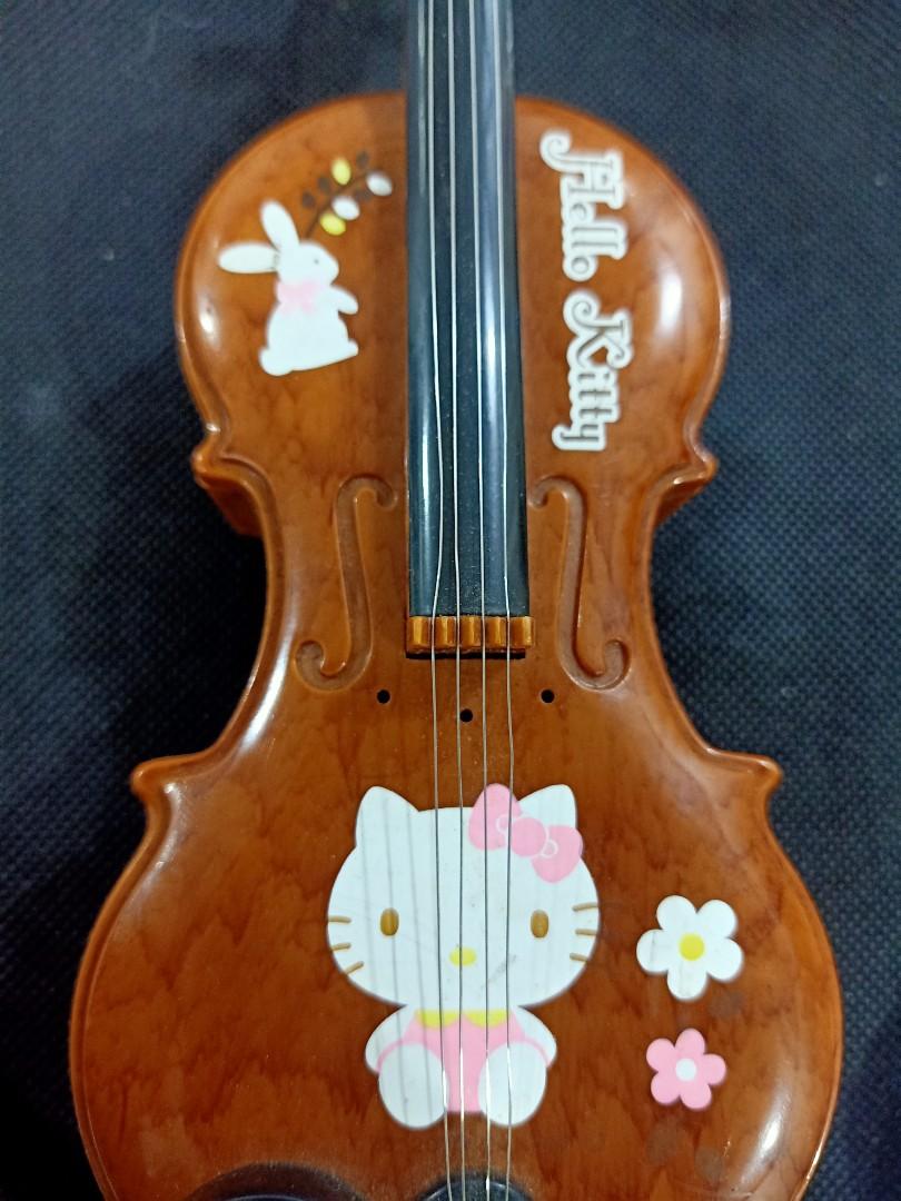 Hello kitty toy violin, Hobbies & Toys, Toys & Games on Carousell