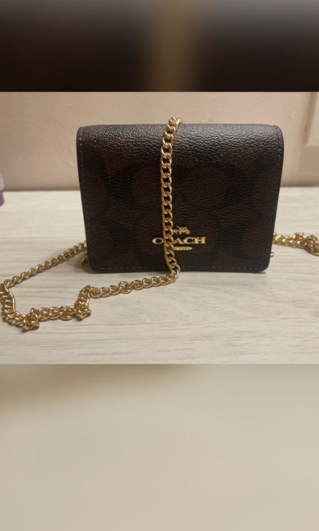 coach mini sling wallet, Luxury, Bags & Wallets on Carousell
