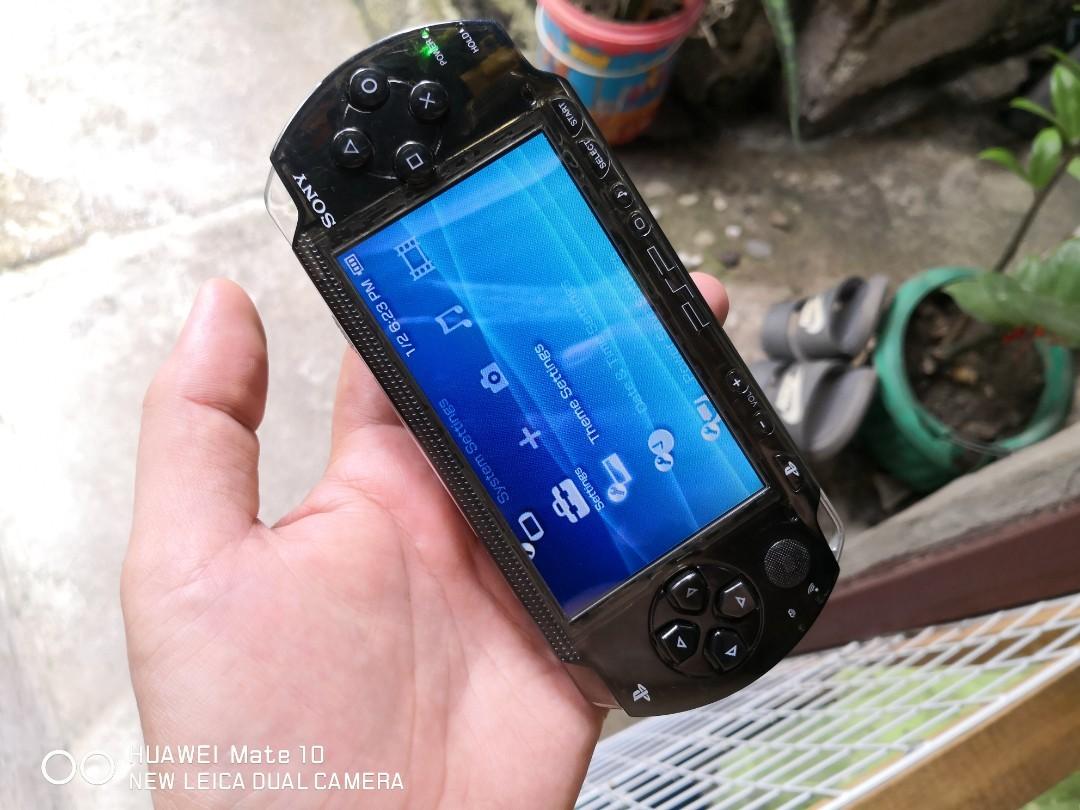 FOR SALE: SONY PSP TRANSPARENT BLACK, 32GB With 51 Game's installed ...