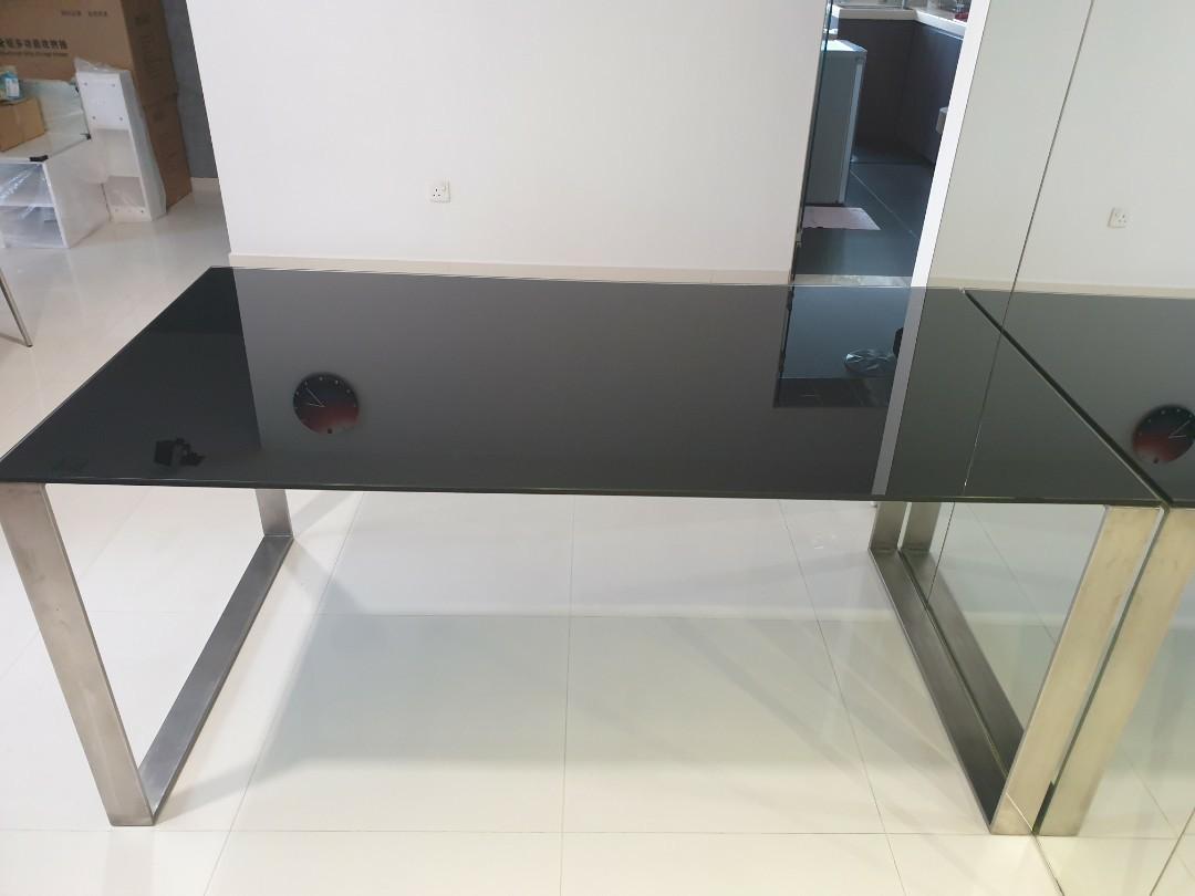 Free coffee table. Elegant black reflective glass rectangle table with ...