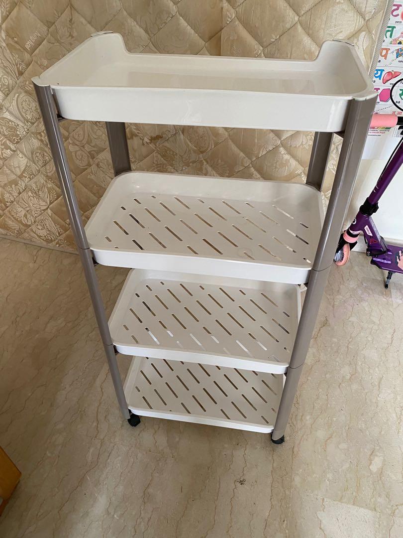 Four tier tray with wheels in very good condition, Furniture & Home ...
