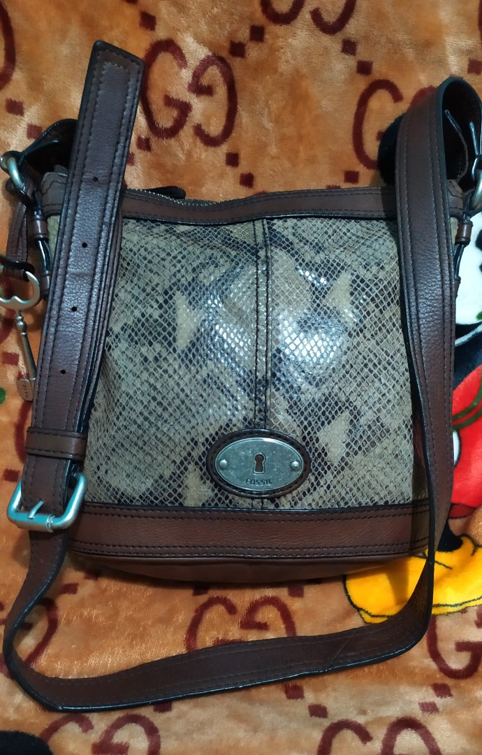 Fossil Snake Skin Bucket Sling Bag, Luxury, Bags & Wallets on Carousell