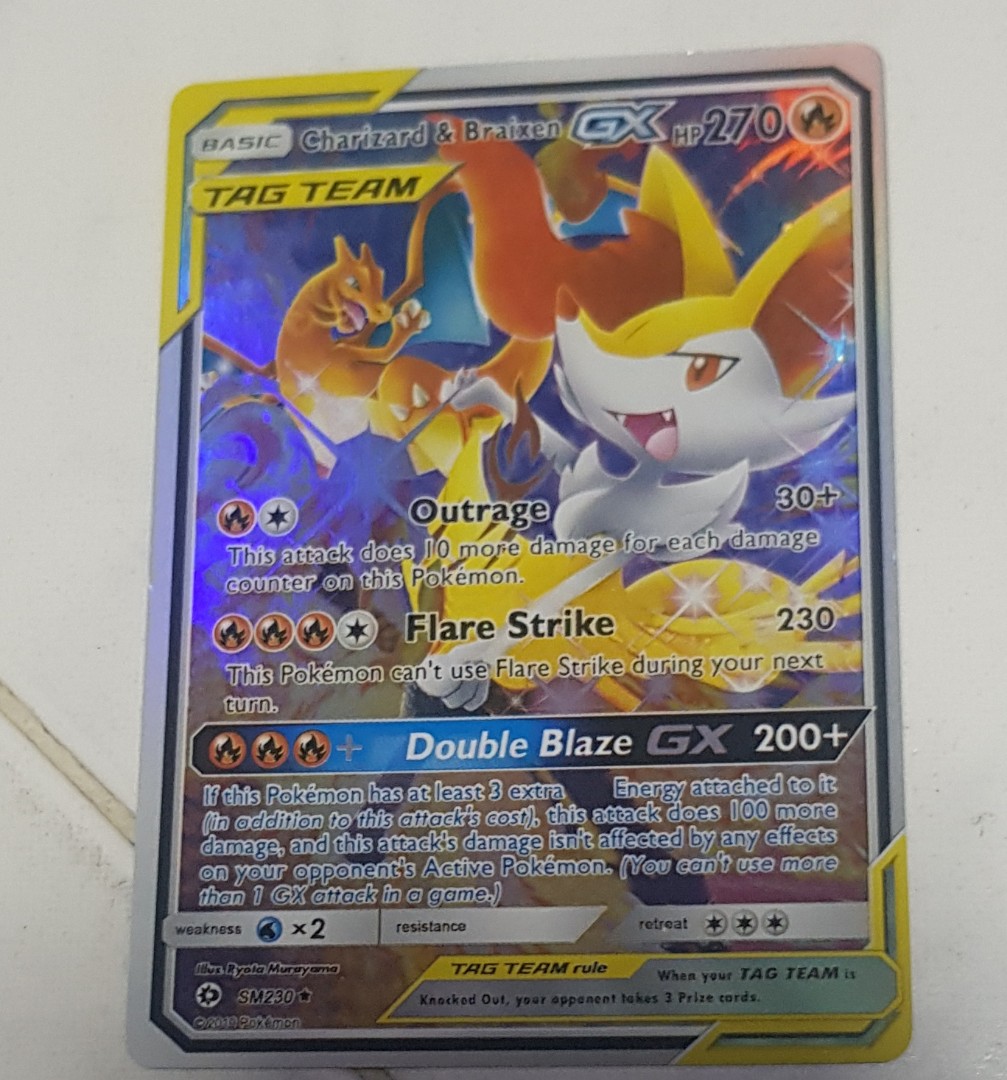 POKEMON CARD Charizard and Braxien tag team, Everything Else on Carousell