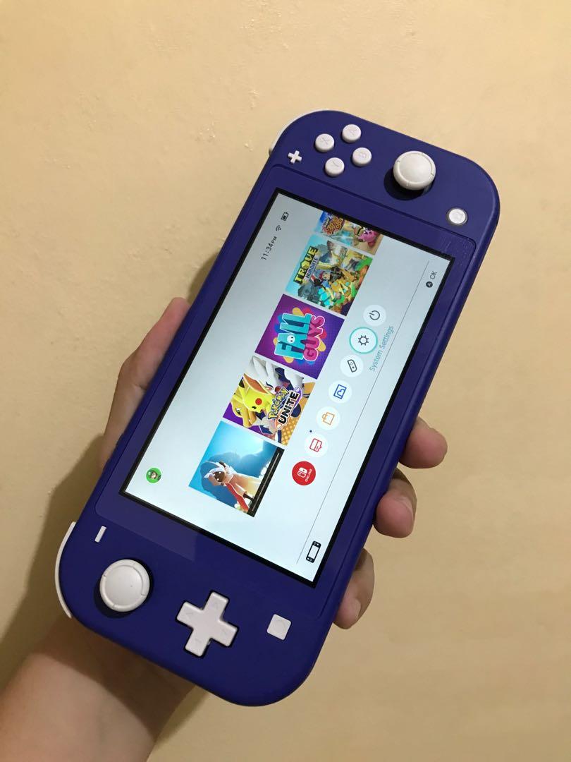 Nintendo switch lite with games, Video Gaming, Video Game Consoles ...