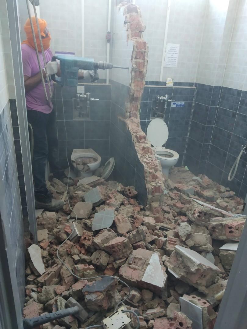 Hacking wall, floor tiles, toilet and kitchen. Tilling and ...