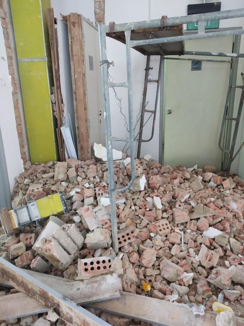 Hacking wall, floor tiles, toilet and kitchen. Tilling and ...