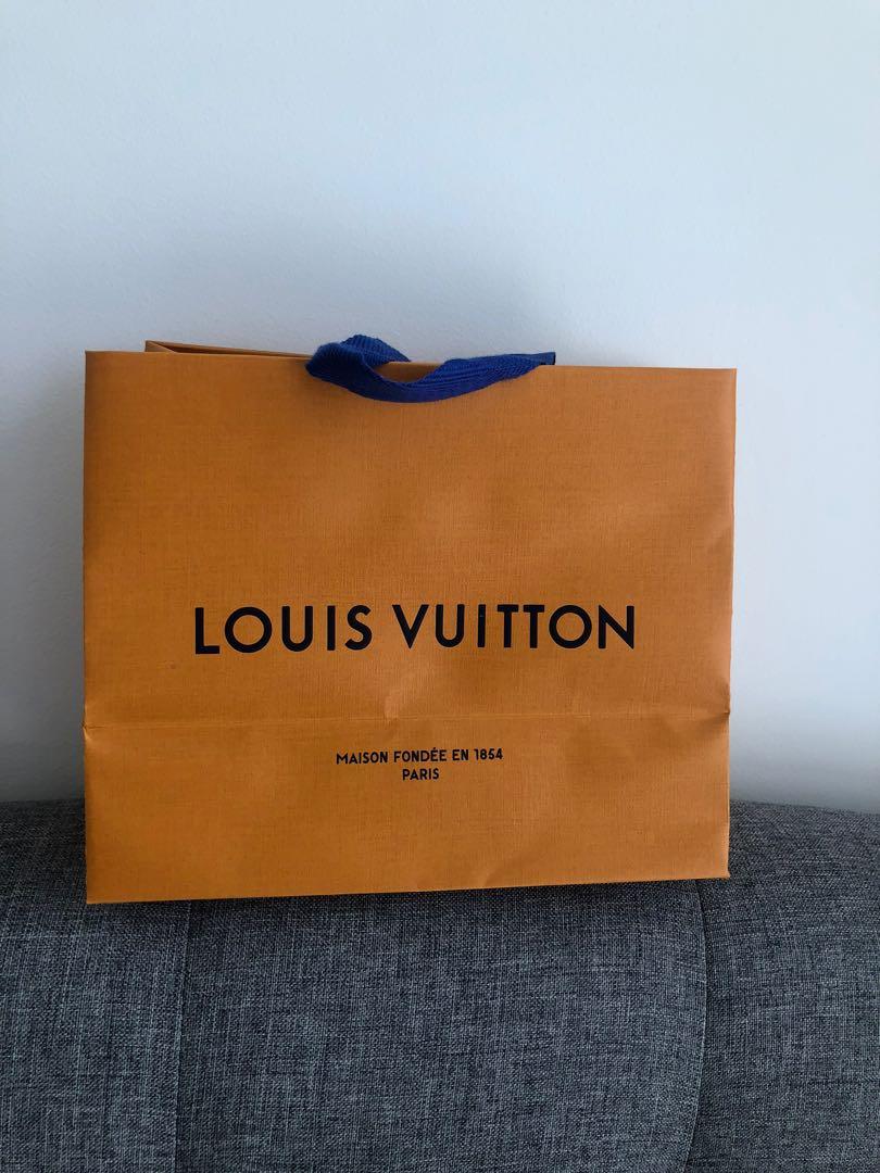 LV paper bag, Women's Fashion, Bags & Wallets, Purses & Pouches on ...