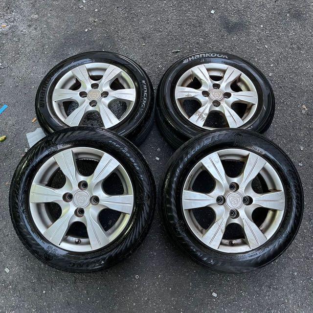 Original 14 inch sport rim Saga tyre 70%, Auto Accessories on Carousell