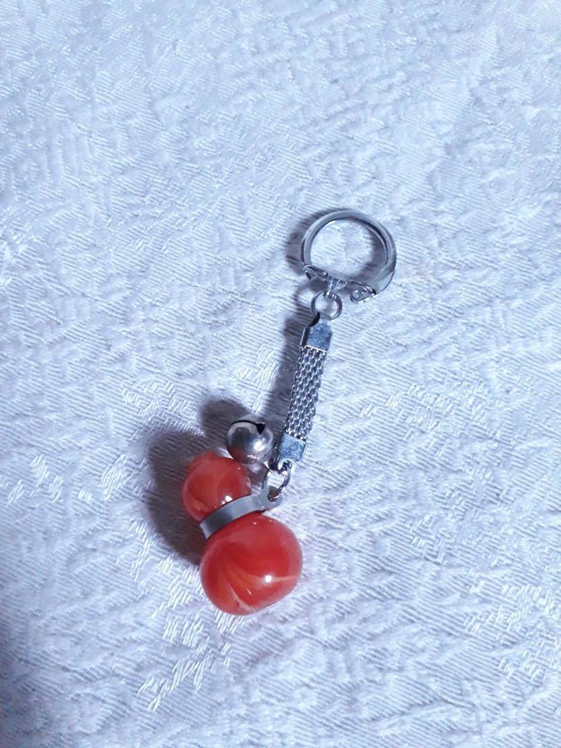 Small Orange Plastic Charm/ Keychain with Image of Buddha, Hobbies ...