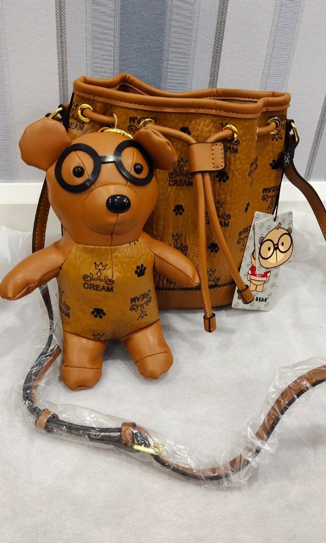 Cream bear sling bag, Luxury, Bags & Wallets on Carousell