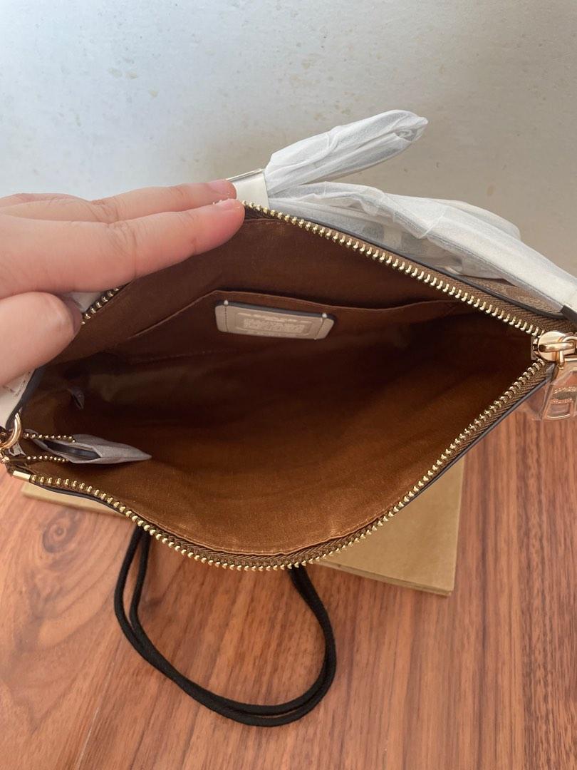 Coach Rowan File Bag in Signature Canvas, Women's Fashion, Bags ...