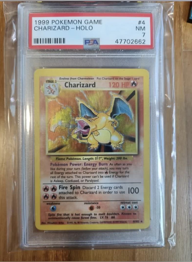 Charizard base set PSA 7, Hobbies & Toys, Toys & Games on Carousell