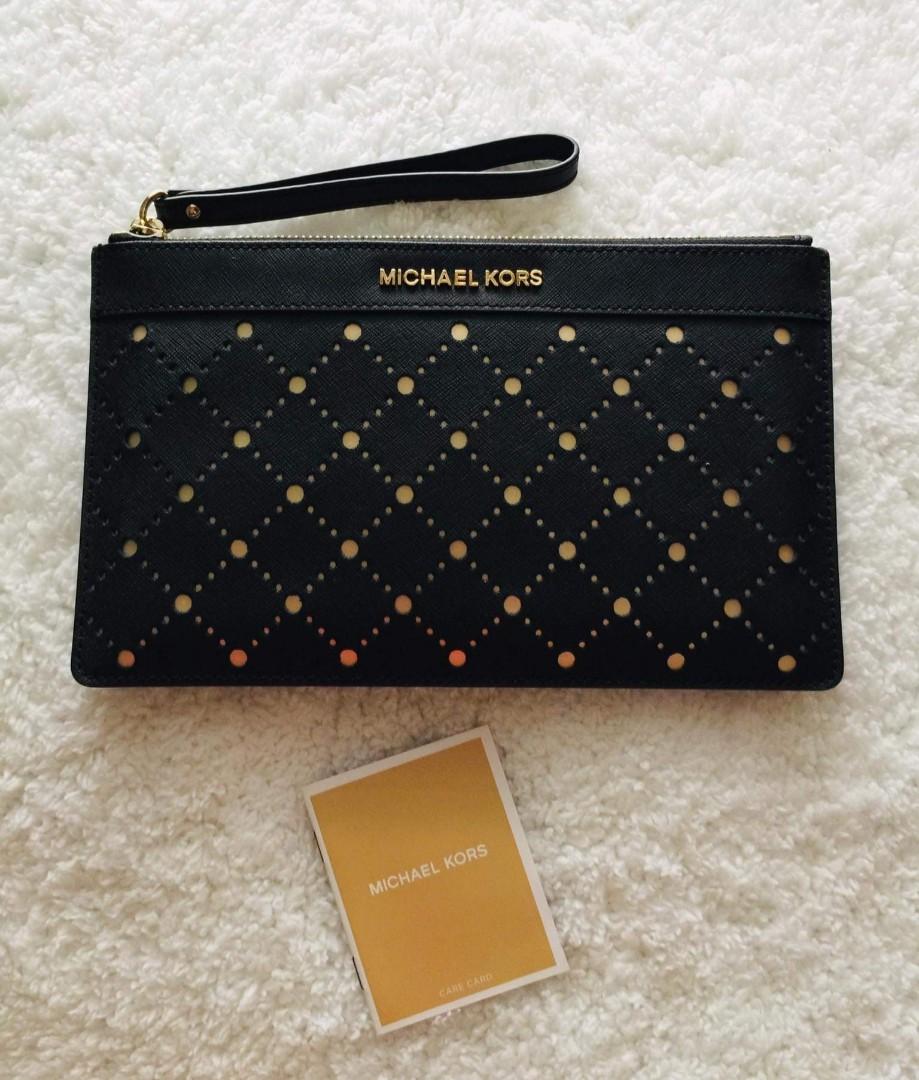 Michael Kors Pouch 100% Original, Luxury, Bags & Wallets on Carousell
