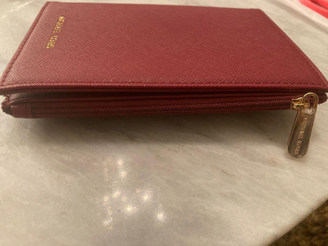 Michael Kors passport holder with zip, Luxury, Bags & Wallets on Carousell