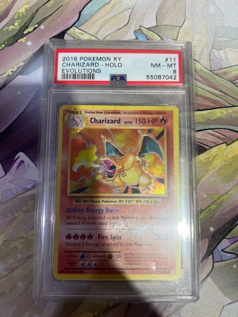 Pokemon PSA 8 Charizard Holo Evolutions, Hobbies & Toys, Toys & Games on Carousell
