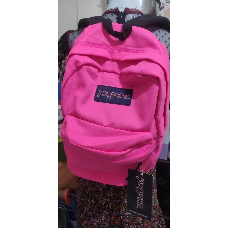 Jansport neon pink, Women's Fashion, Bags & Wallets, Backpacks on Carousell