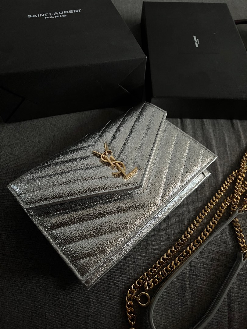 Ysl silver clutch with gold hardware strap, Luxury, Bags & Wallets on ...