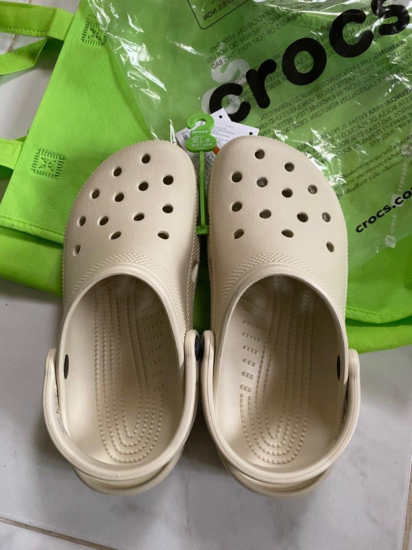 Crocs Classic Clog in Bone, Women's Fashion, Footwear, Loafers on Carousell