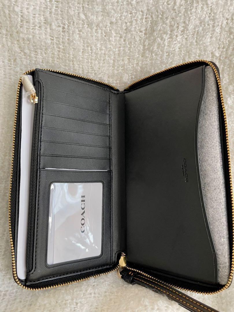 Dempsey Large Phone Wallet In Signature Canvas With Souvenir Skyline ...