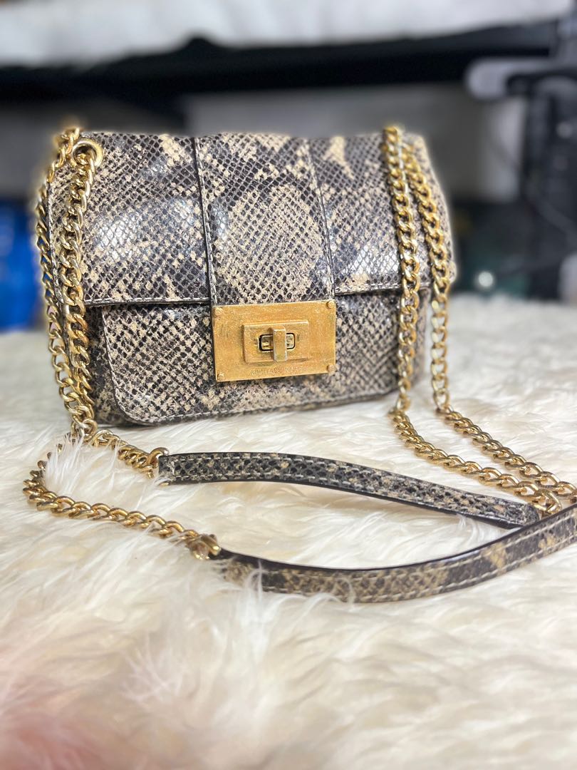 MK python sling bag, Women's Fashion, Bags & Wallets, Cross-body Bags ...