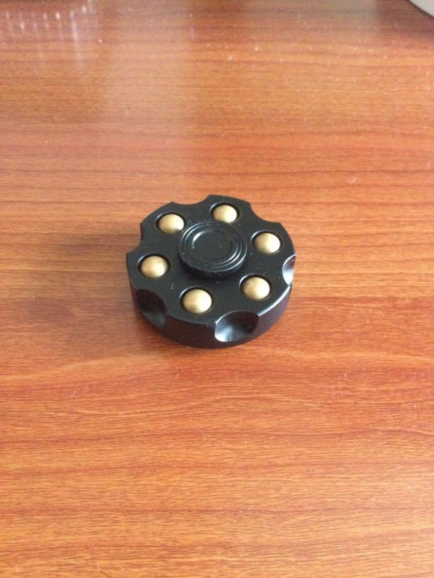 Revolver fidget spinner, Hobbies & Toys, Toys & Games on Carousell