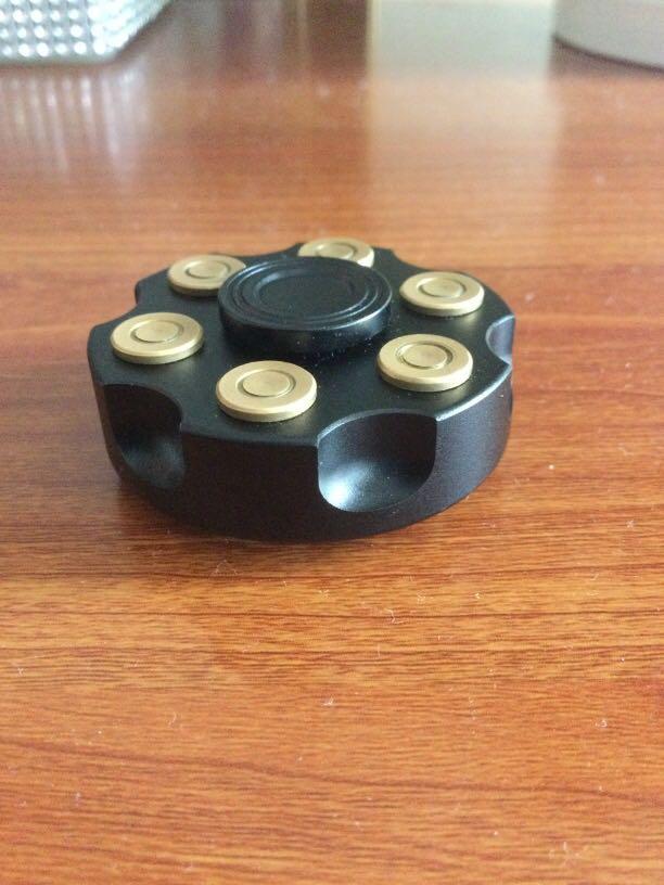 Revolver fidget spinner, Hobbies & Toys, Toys & Games on Carousell