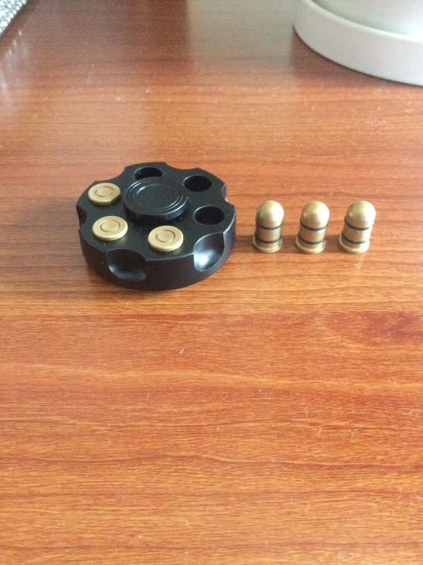 Revolver fidget spinner, Hobbies & Toys, Toys & Games on Carousell