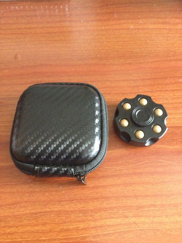Revolver fidget spinner, Hobbies & Toys, Toys & Games on Carousell