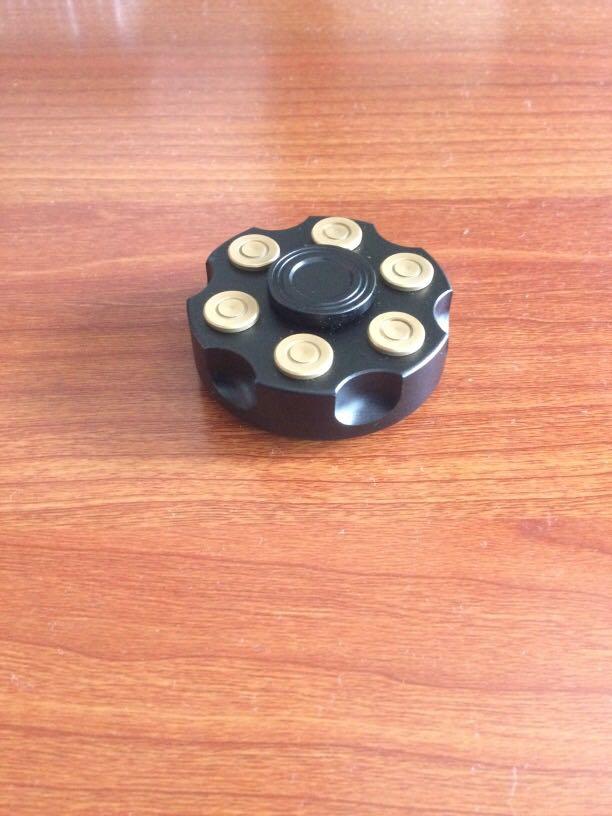 Revolver fidget spinner, Hobbies & Toys, Toys & Games on Carousell