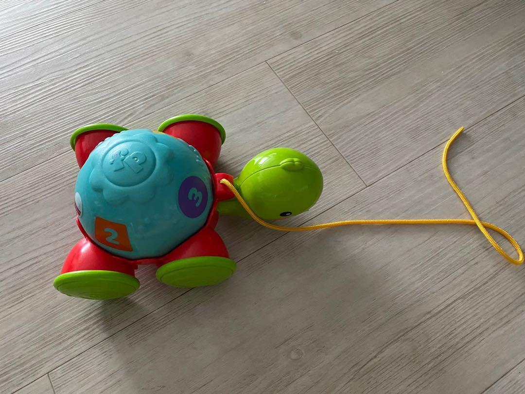 Fisher price pull along turtle, Babies & Kids, Infant Playtime on Carousell