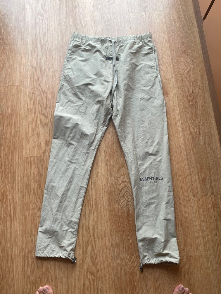 Fear of god essentials track pants, Men's Fashion, Bottoms, Joggers on ...