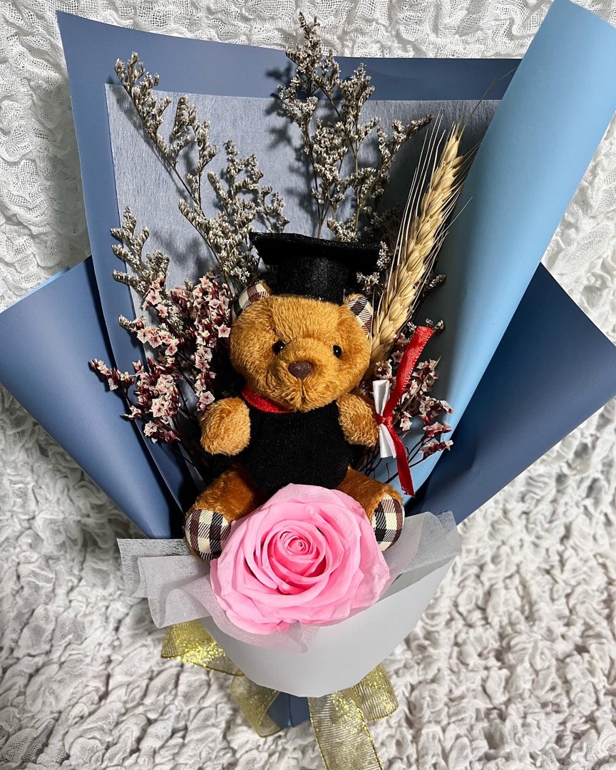 Graduation bear with rose flowers bouquet, Hobbies & Toys, Stationery ...