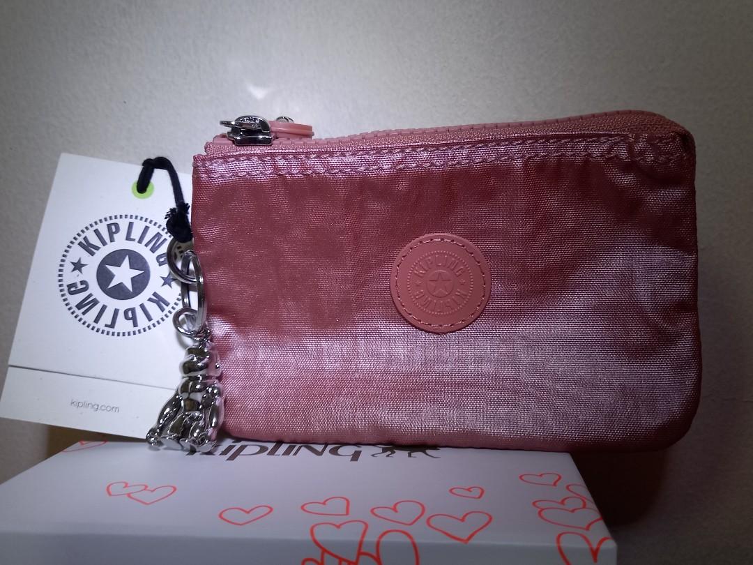 Kipling Creativity S in metallic rust, Women's Fashion, Bags & Wallets ...