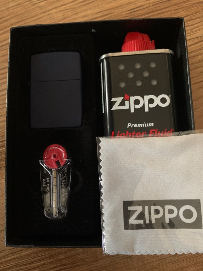 Zippo lighter with accessories , Everything Else on Carousell