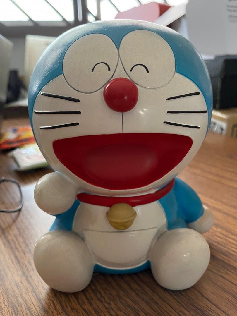 Doraemon piggy bank, Hobbies & Toys, Toys & Games on Carousell