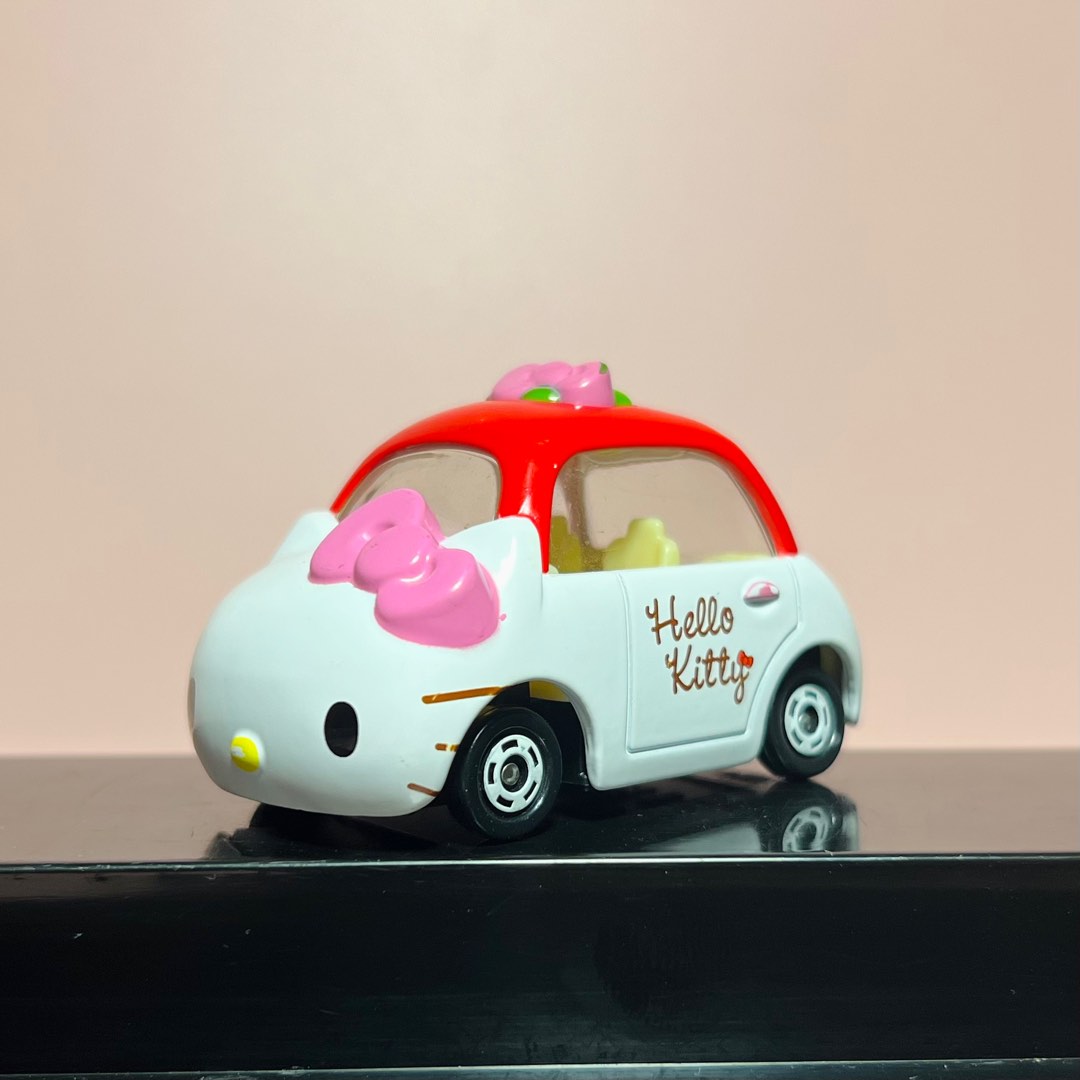 TOMICA Sanrio Hello Kitty car (w/paint chip on one eye and nose) 5x3.5cm - Php 200, Hobbies ...