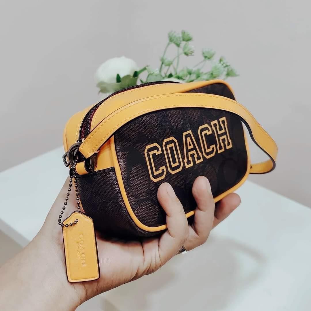 Coach Jamie Wrislet in Signature Canvas with Varsity Motif in Brown ...