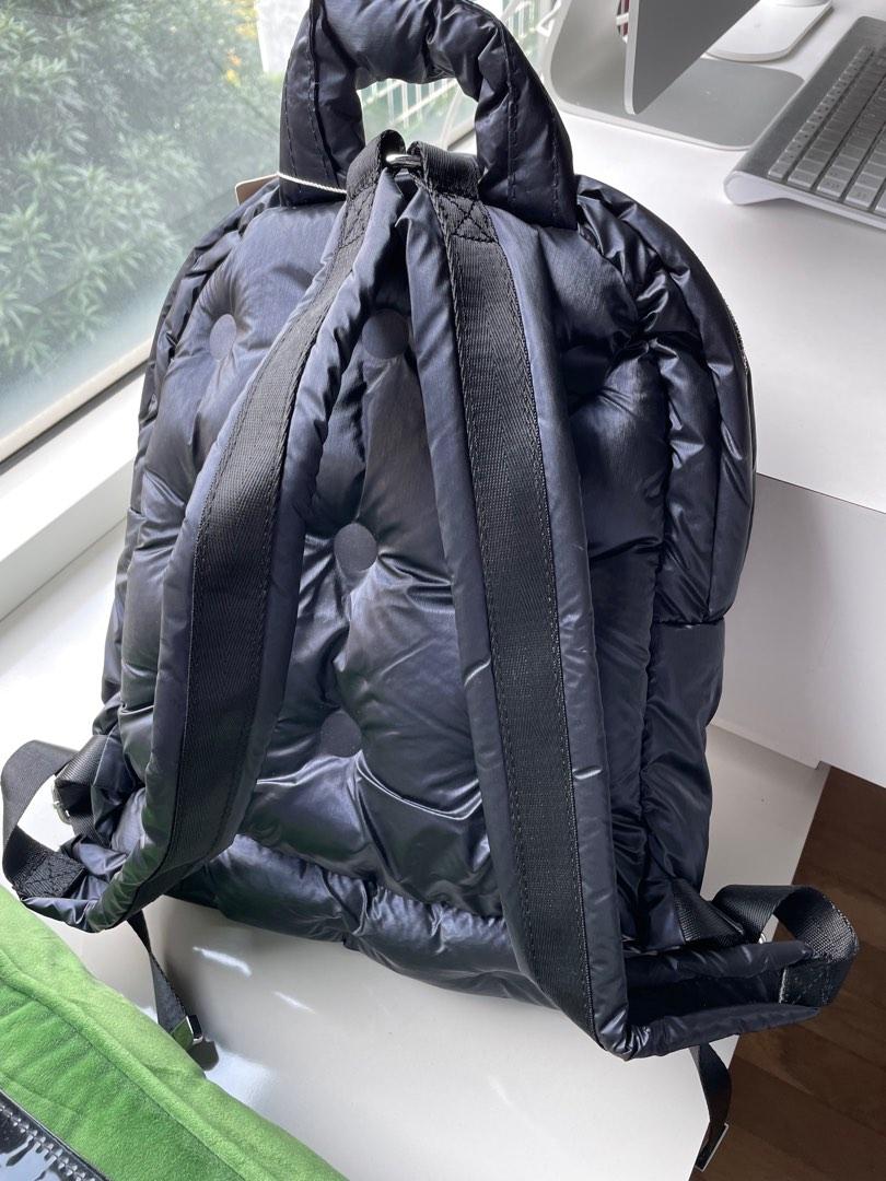 Cocoon puffy backpack, Luxury, Bags & Wallets on Carousell